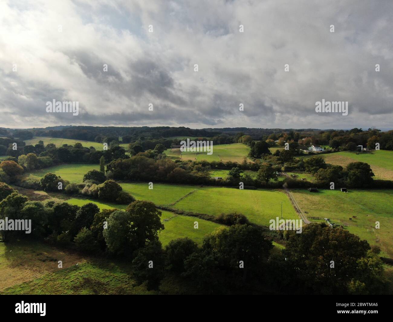 aerial view of lovely countryside with cloud and sunshine and white ...