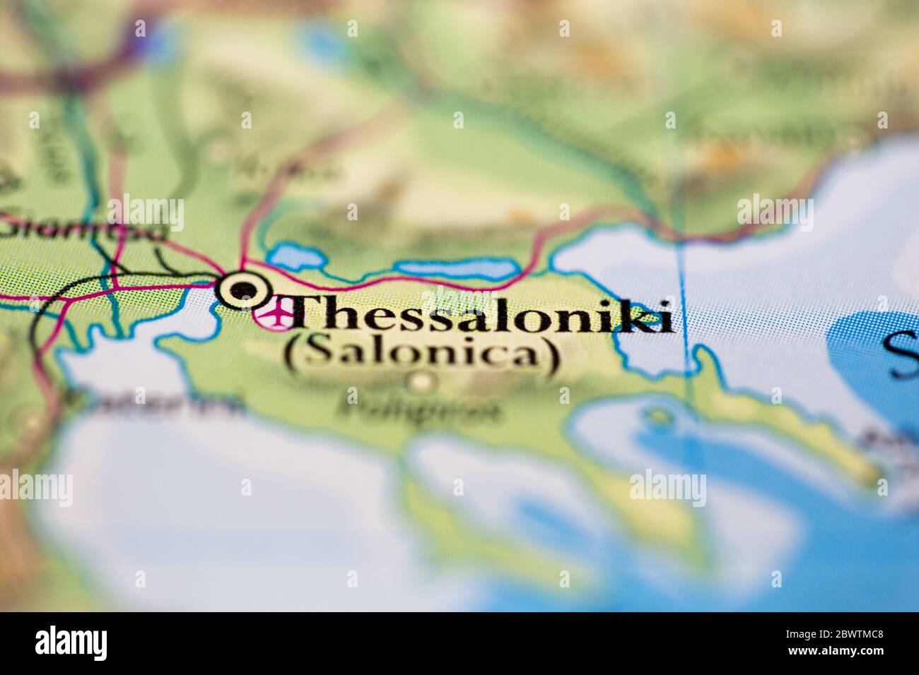 Shallow depth of field focus on geographical map location of ...