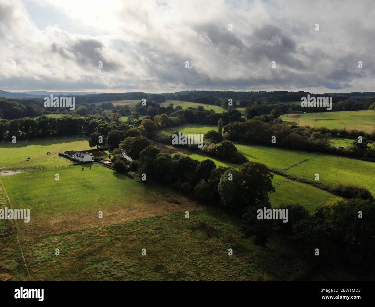 aerial view of lovely countryside with cloud and sunshine and white ...
