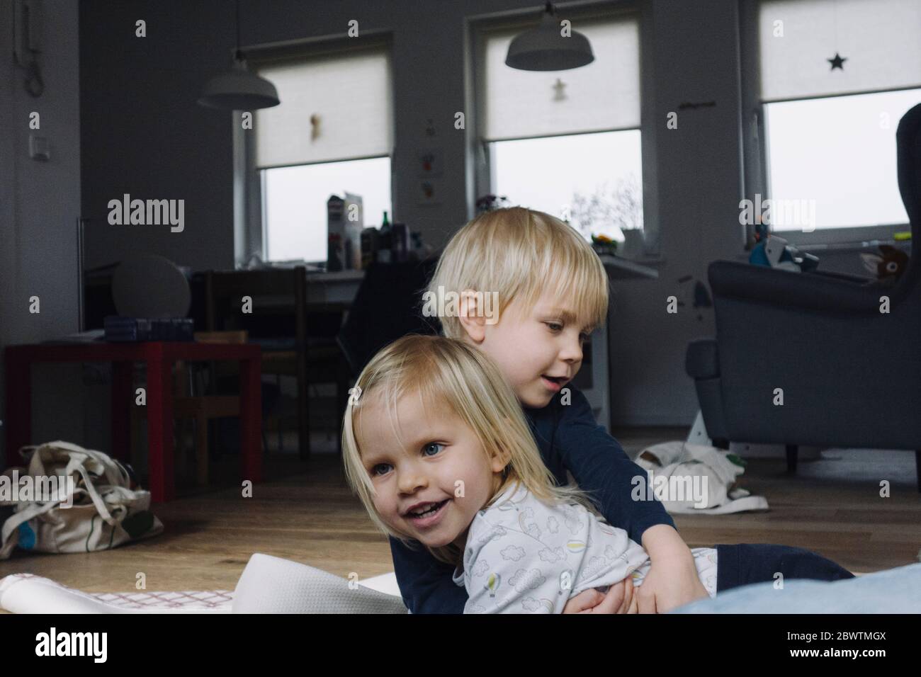 Siblings playing together hi-res stock photography and images - Alamy