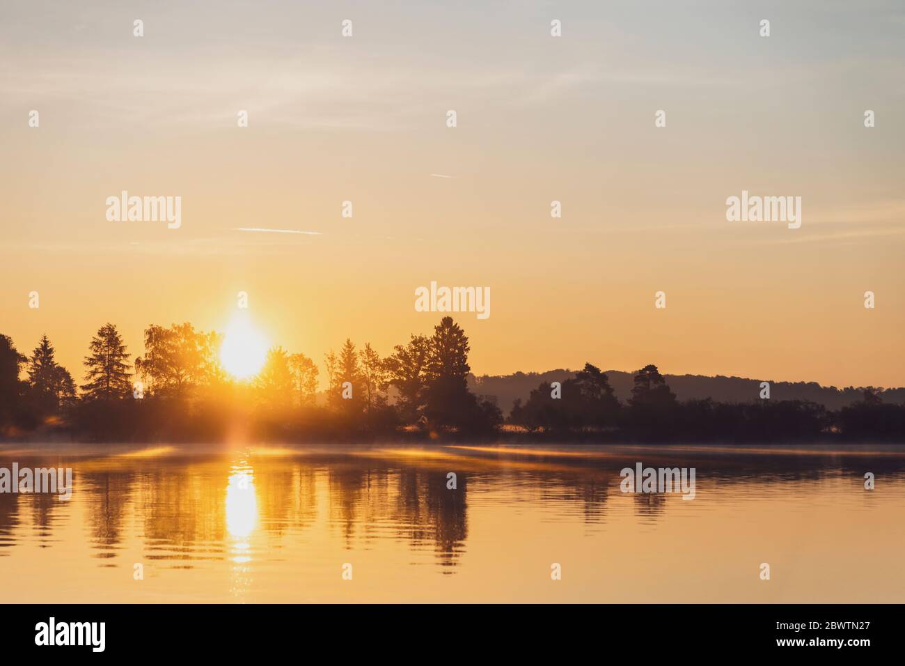 Lake during sunrise, Germany Stock Photo - Alamy