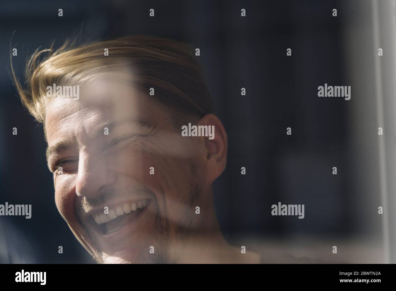 Portrait of a laughing man hi-res stock photography and images - Alamy