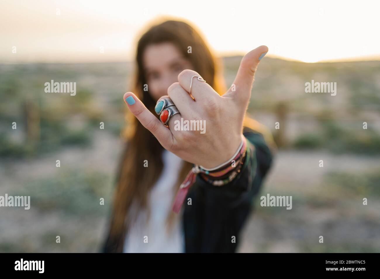 Hand woman showing shaka sign hi-res stock photography and images - Alamy