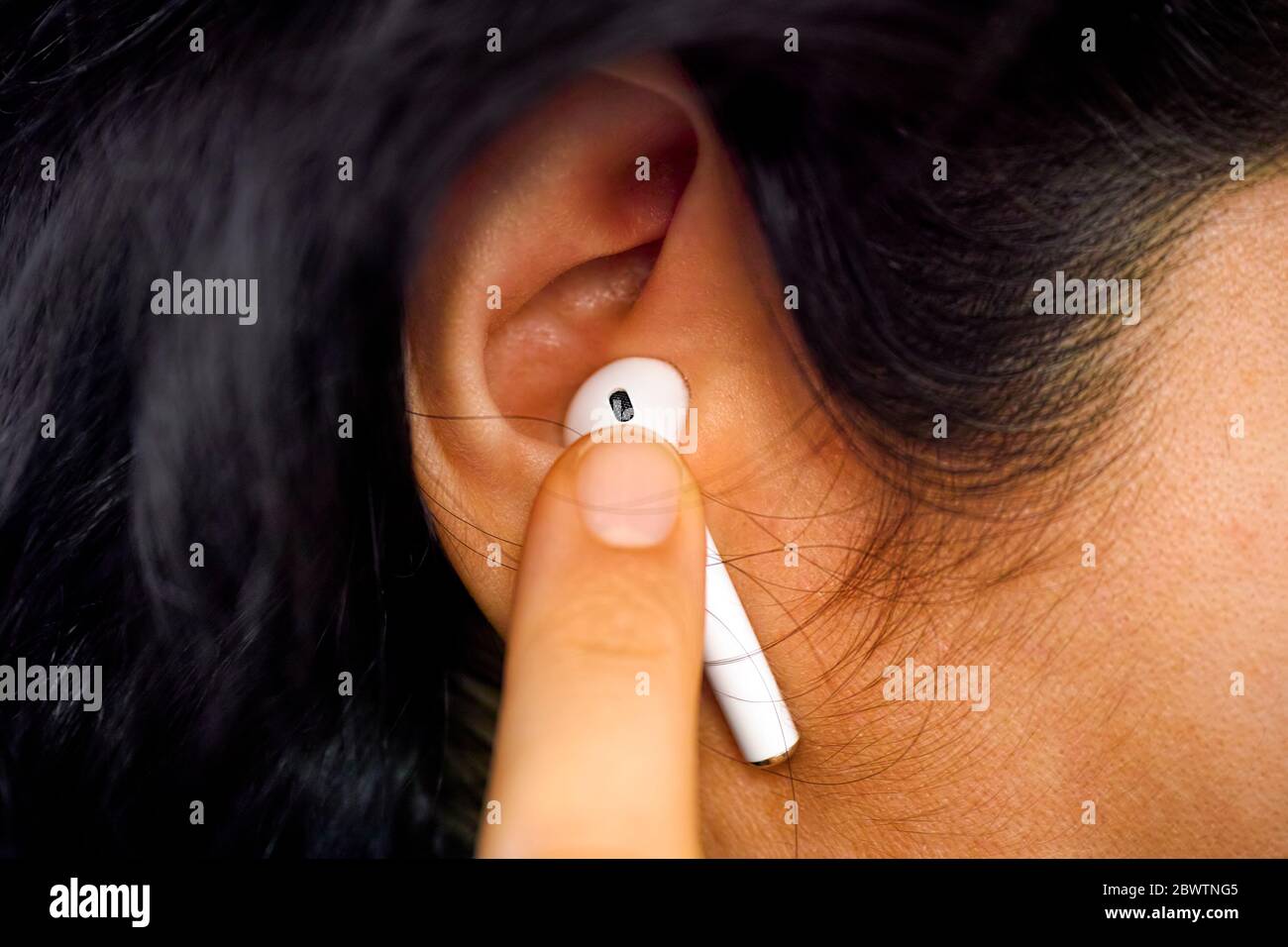 Finger Ear High Resolution Stock Photography and Images - Alamy