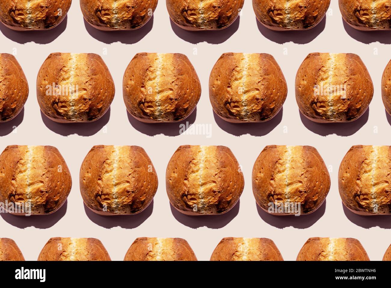 Pattern of rows of freshly baked breads Stock Photo - Alamy