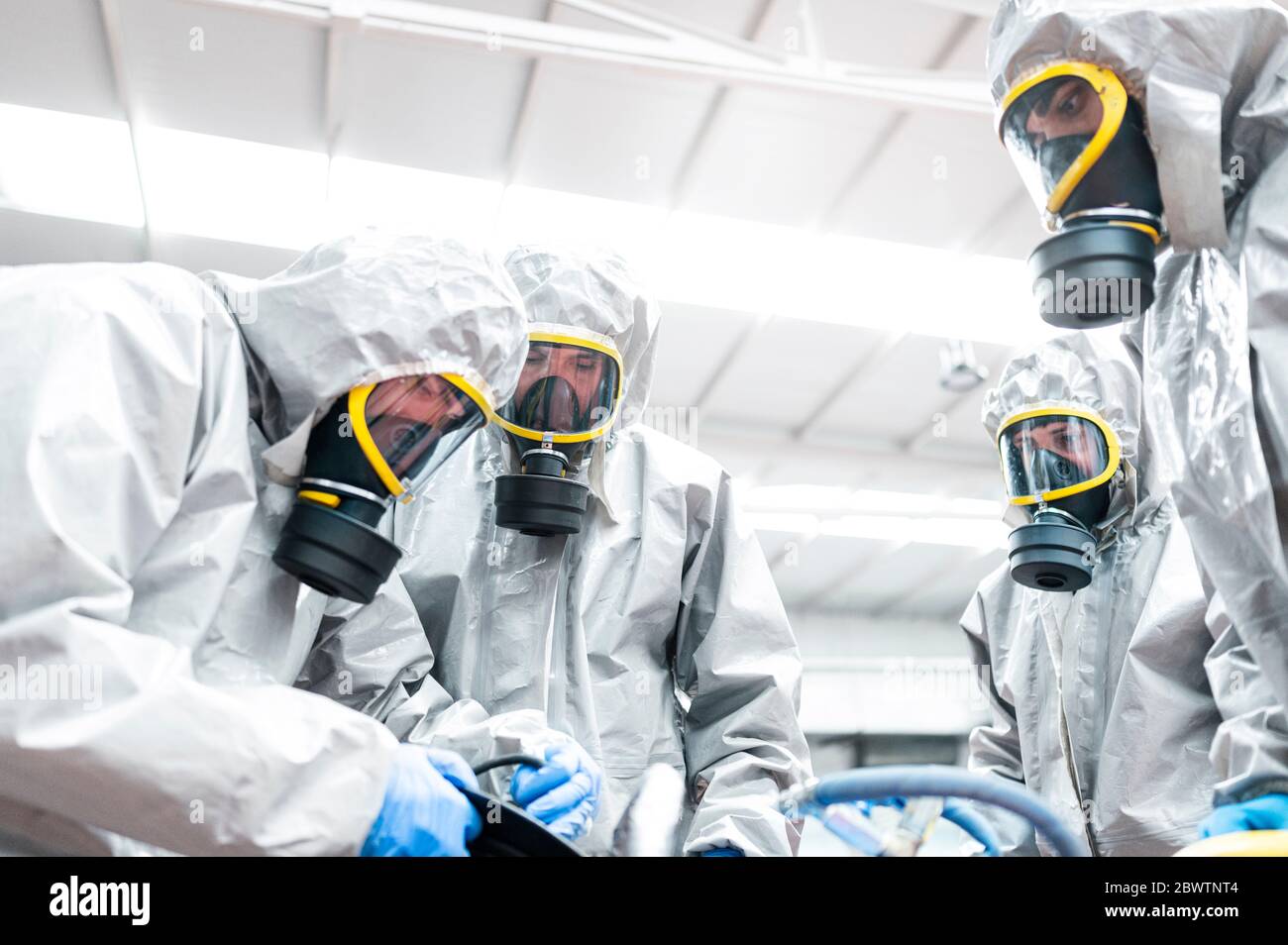 Decontamination suit hi-res stock photography and images - Alamy