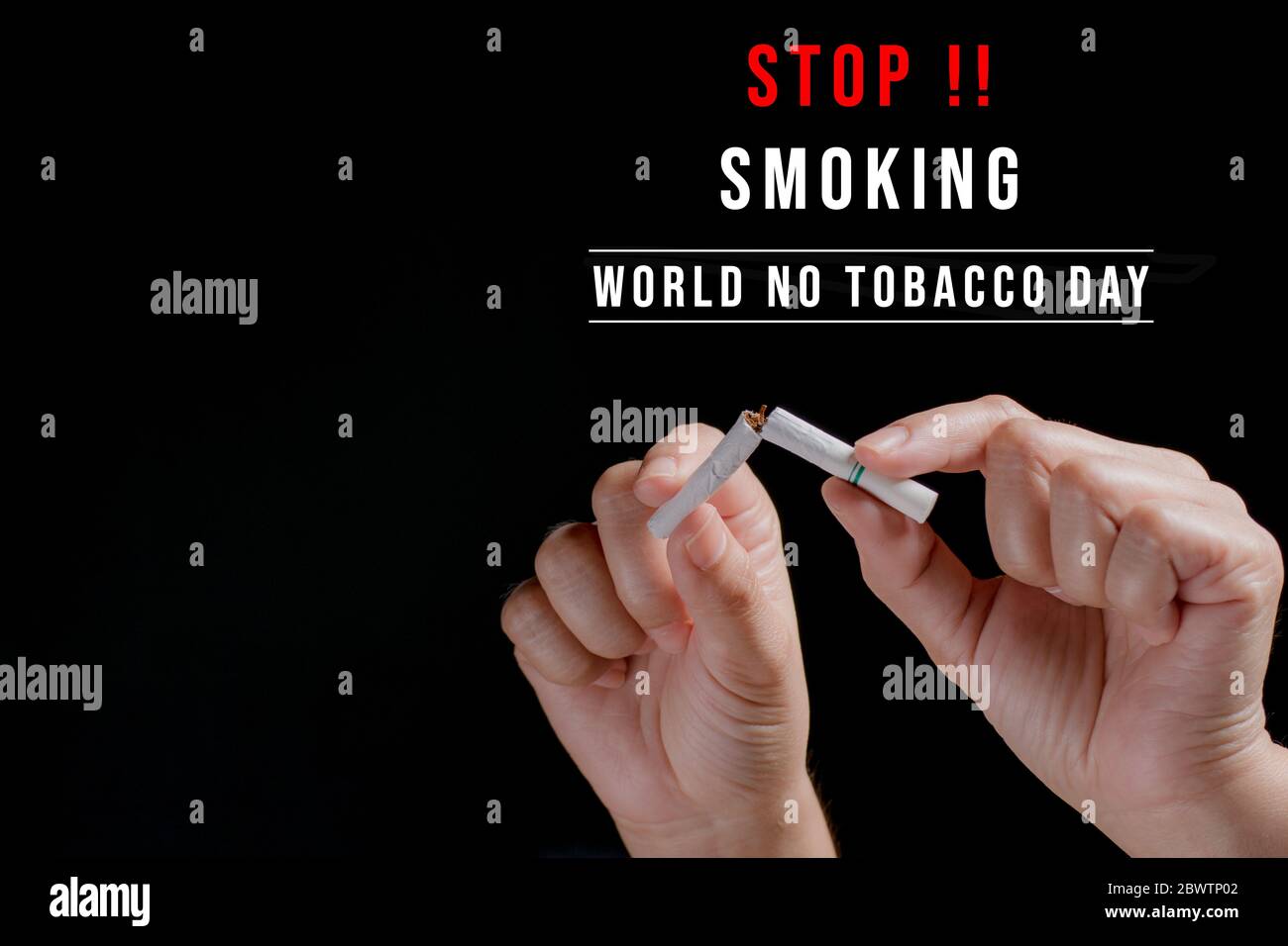 STOP Smoking concept. Close up woman hand destroying cigarettes over ...