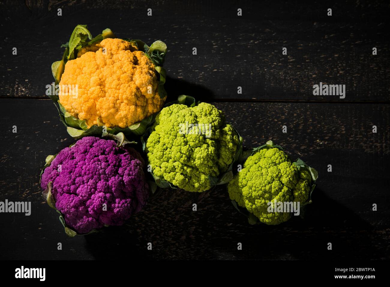 Studio shot of colorful cauliflowers Stock Photo - Alamy