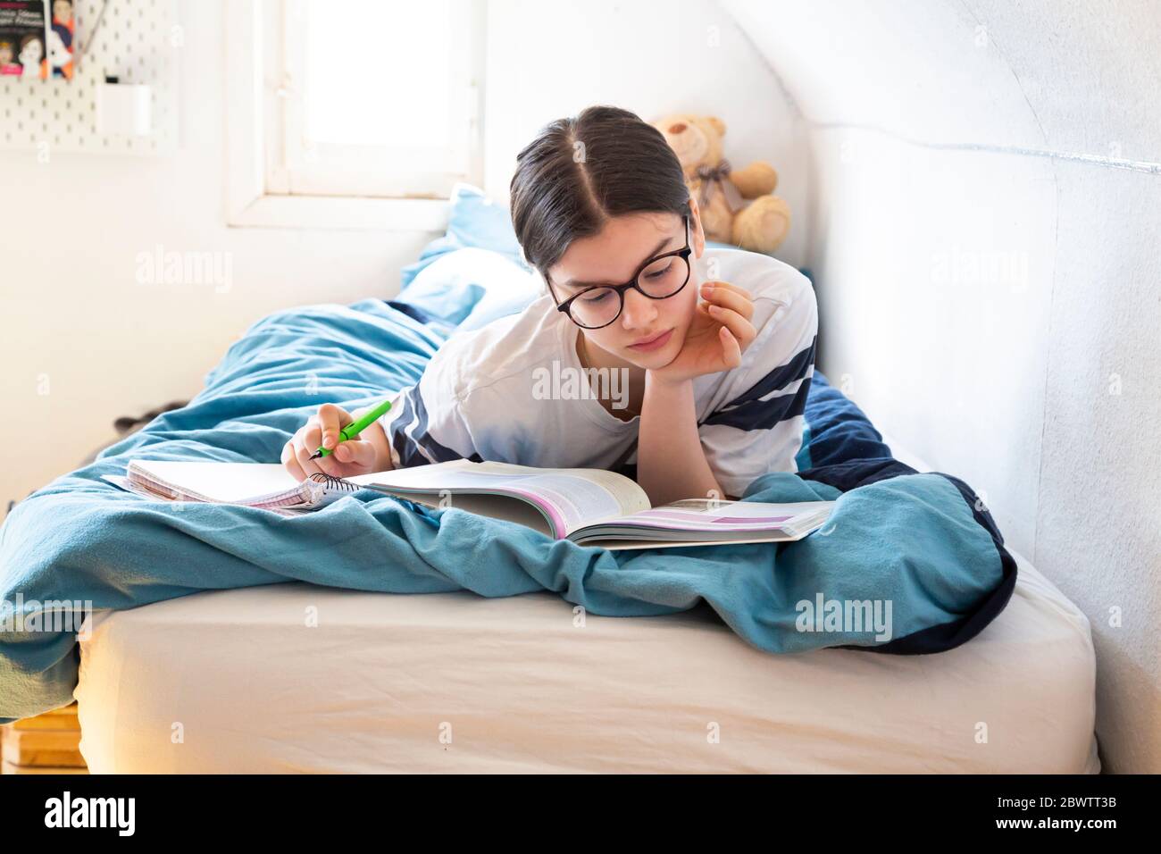 Homework space on bed hi-res stock photography and images - Alamy