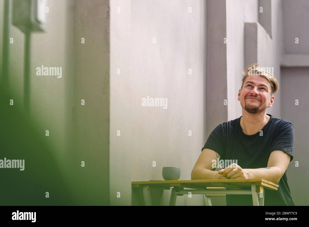Mature man having a drink outside hi-res stock photography and images ...