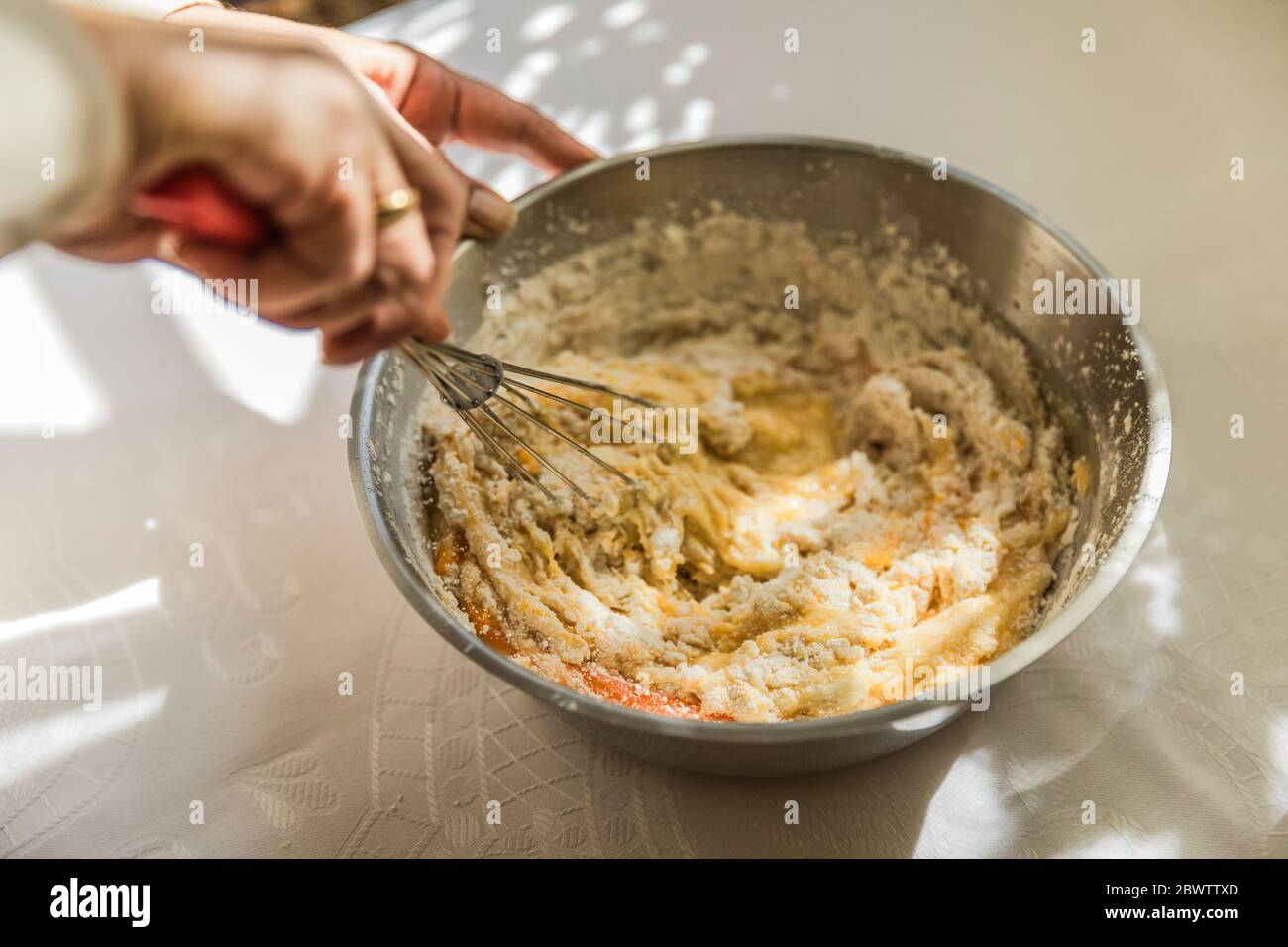 Mixing ingredients in bowl hi-res stock photography and images - Alamy