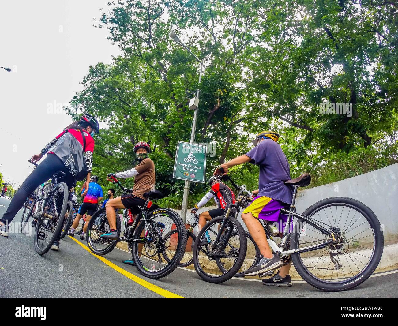Manila, Philippines. 3rd June, 2020. People prepare to ride their ...