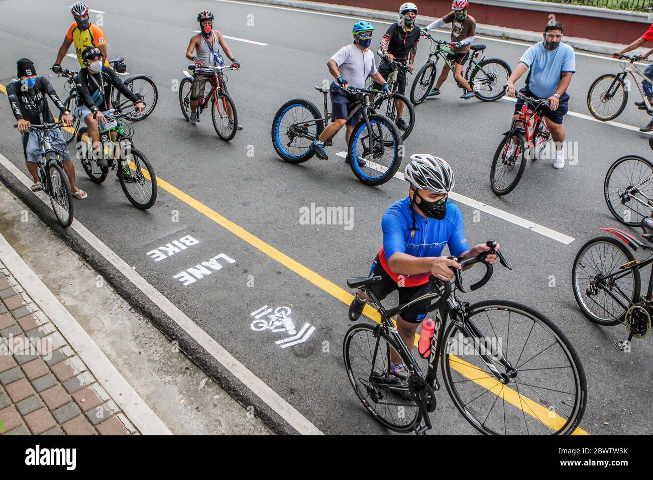 Manila, Philippines. 3rd June, 2020. People prepare to ride their ...
