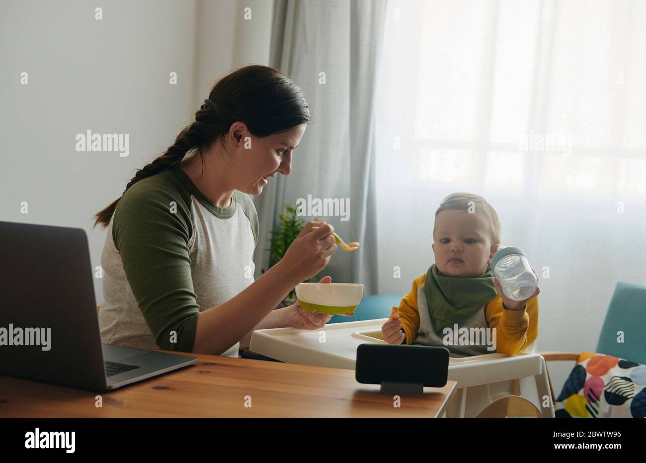 Feeding computer hi-res stock photography and images - Alamy