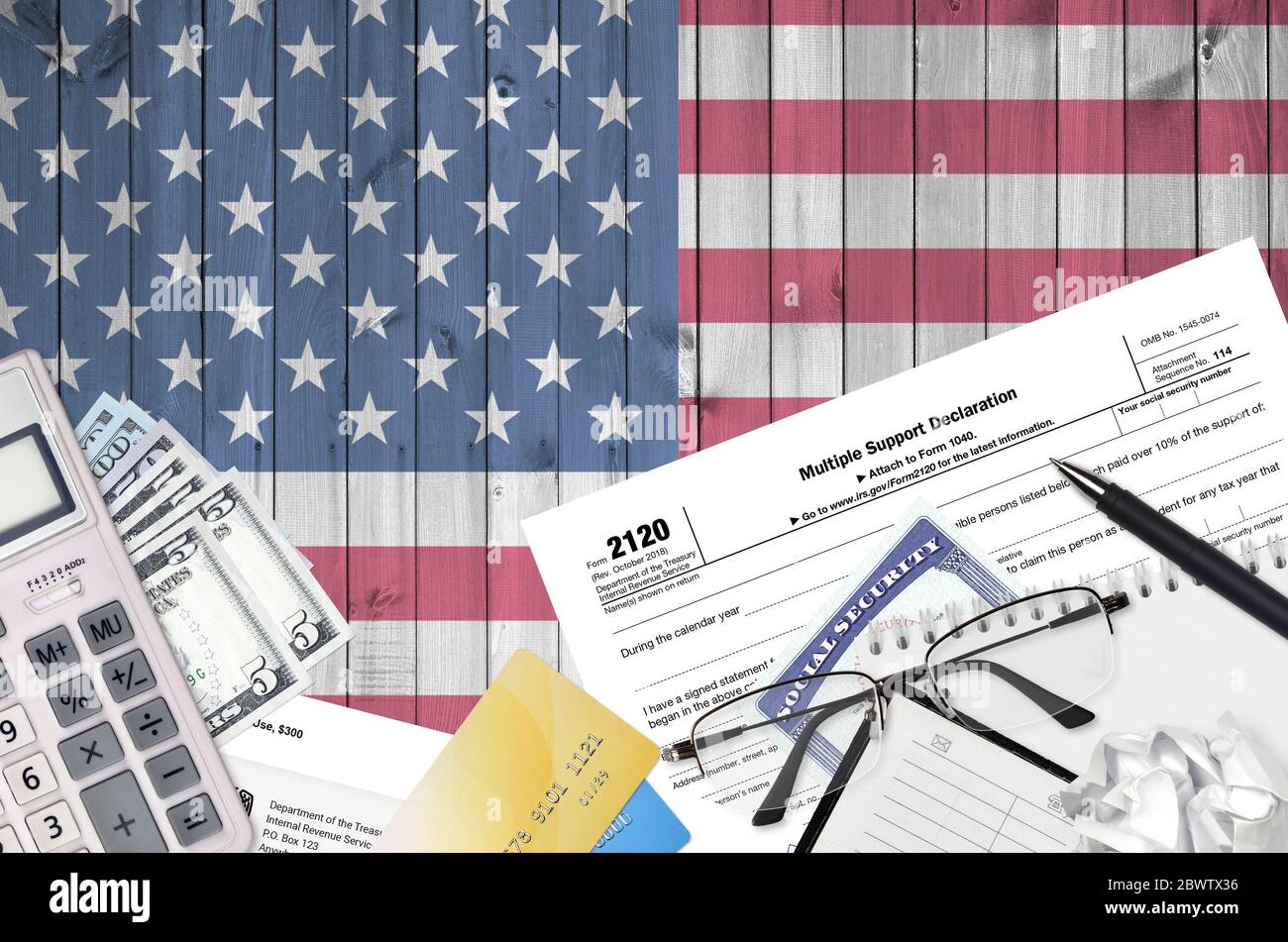 IRS form 2120 Multiple support declaration lies on flat lay office ...