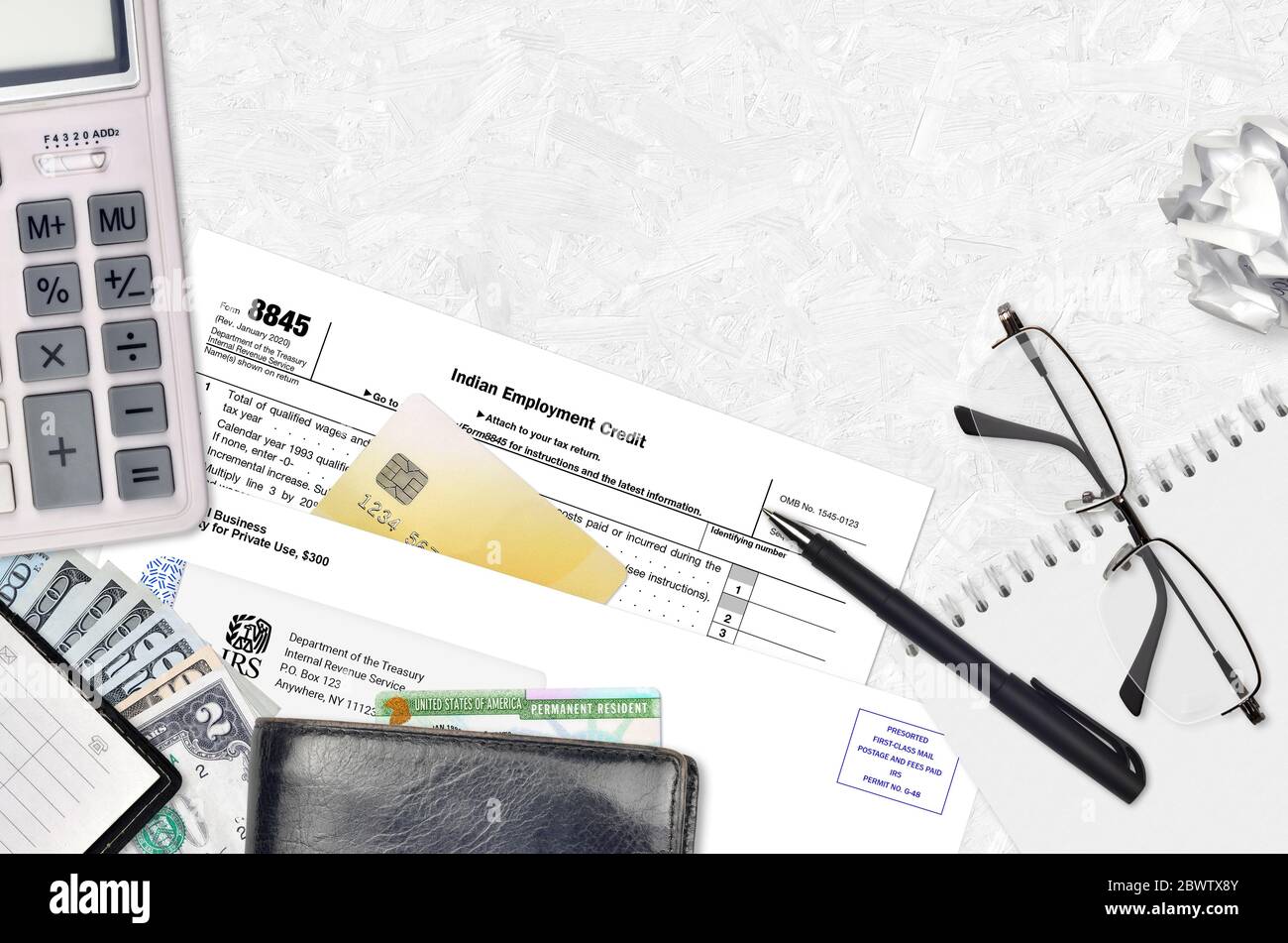 IRS form 8845 Indian Employment credit lies on flat lay office table ...