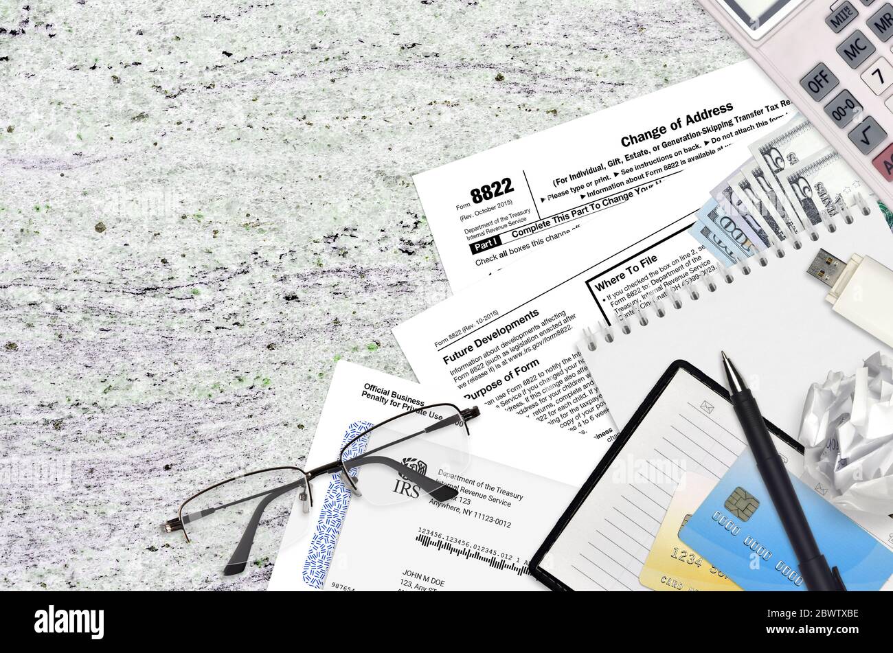 IRS form 8822 Change of Address lies on flat lay office table and ready ...