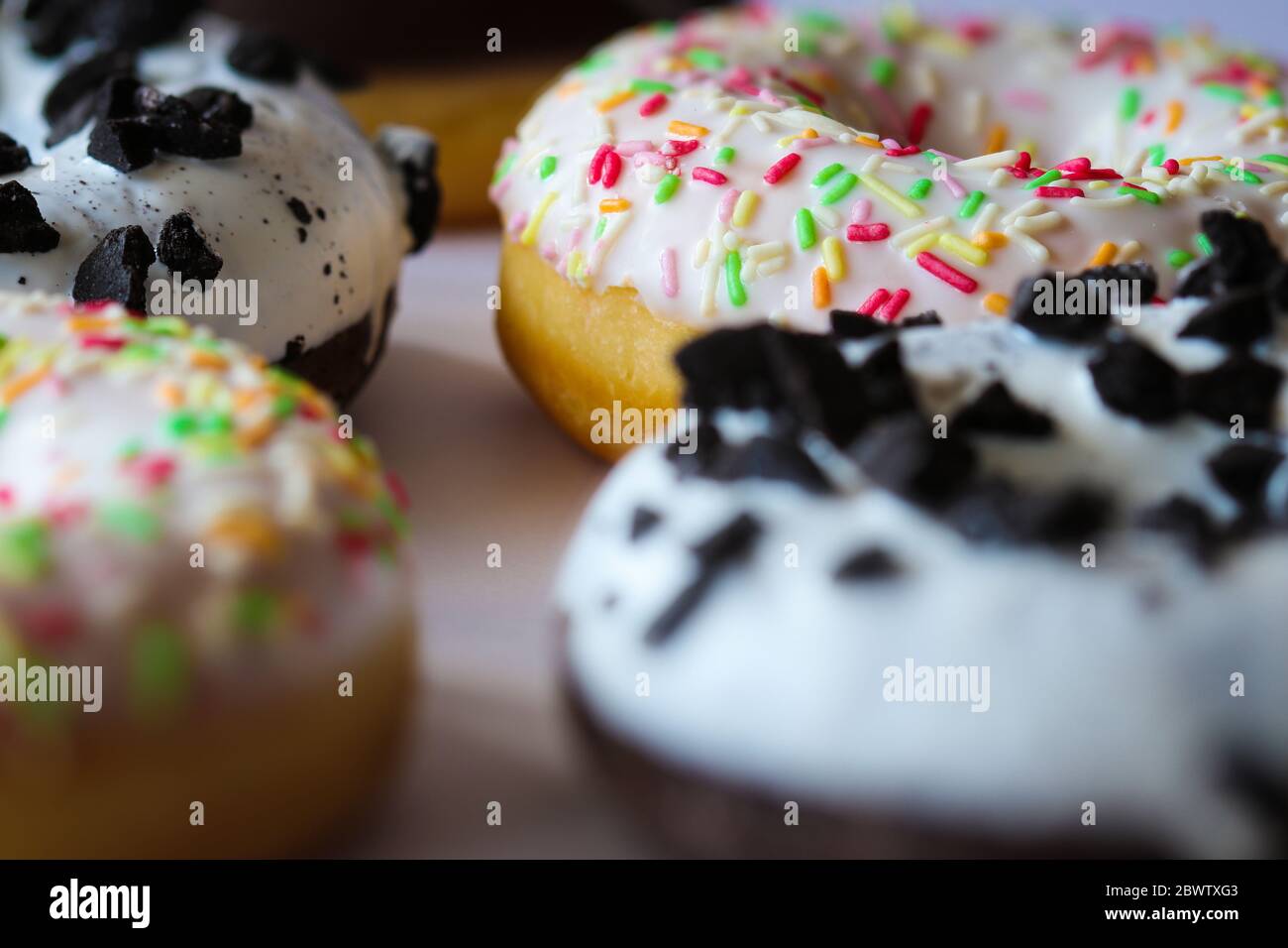 Doughnut ring hundreds and thousands hi-res stock photography and ...
