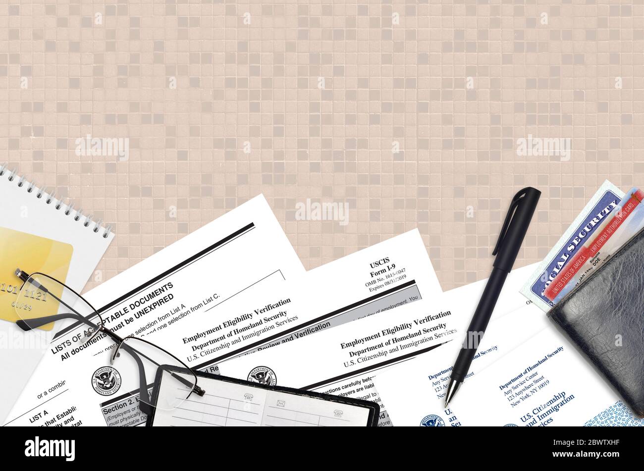 USCIS form I-9 Employment eligibility verification lies on flat lay ...