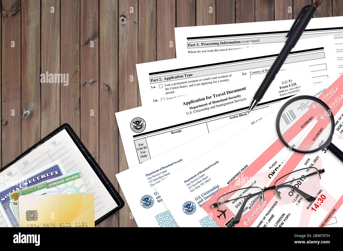 USCIS form I-131 Application for travel document lies on flat lay ...
