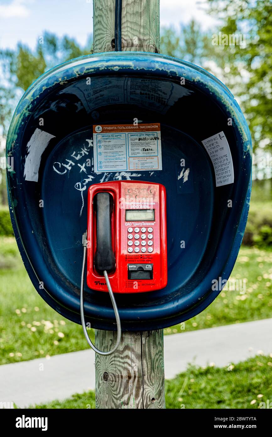 red street payphone in the village Stock Photo - Alamy