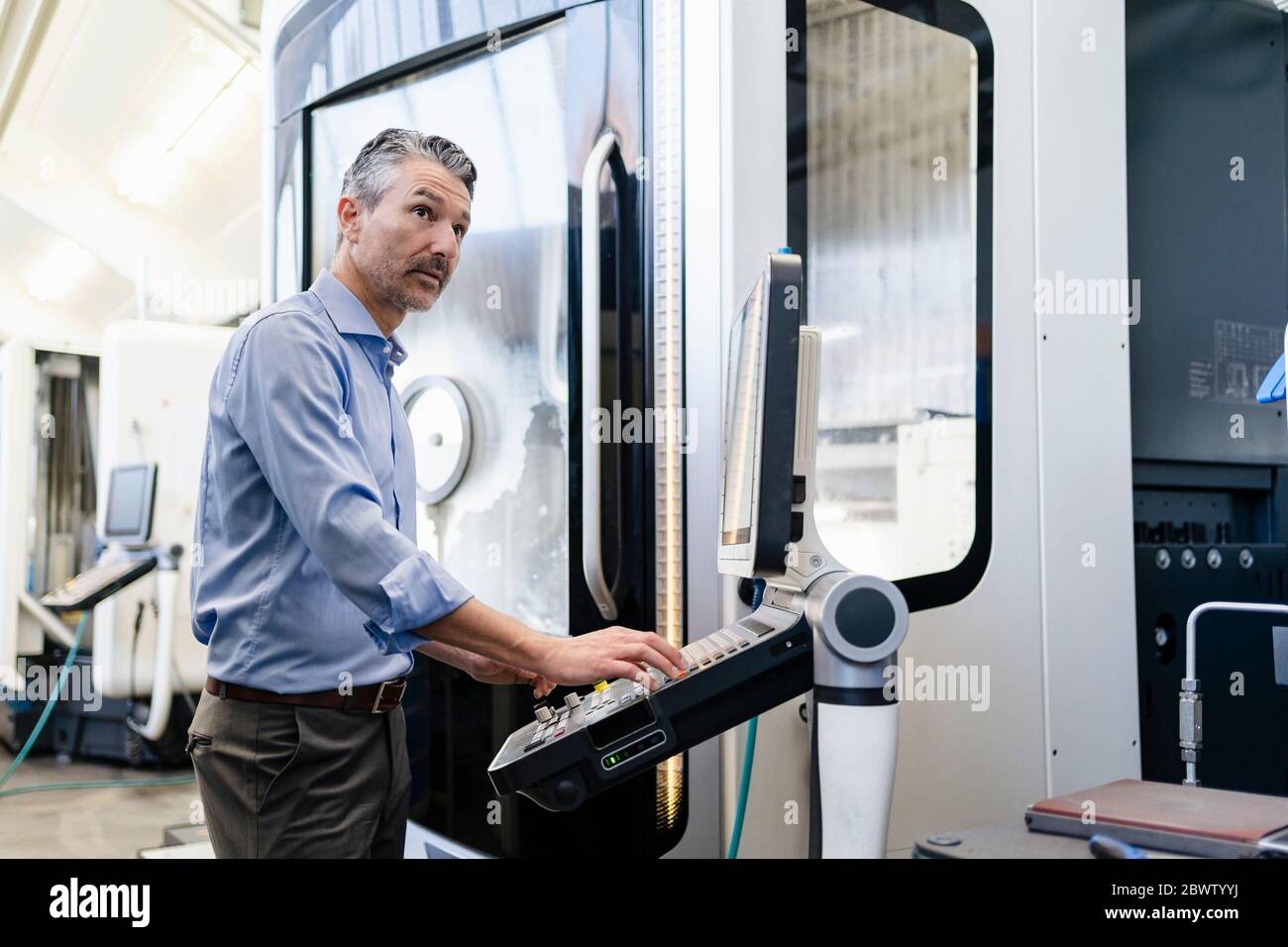 One man production hi-res stock photography and images - Alamy