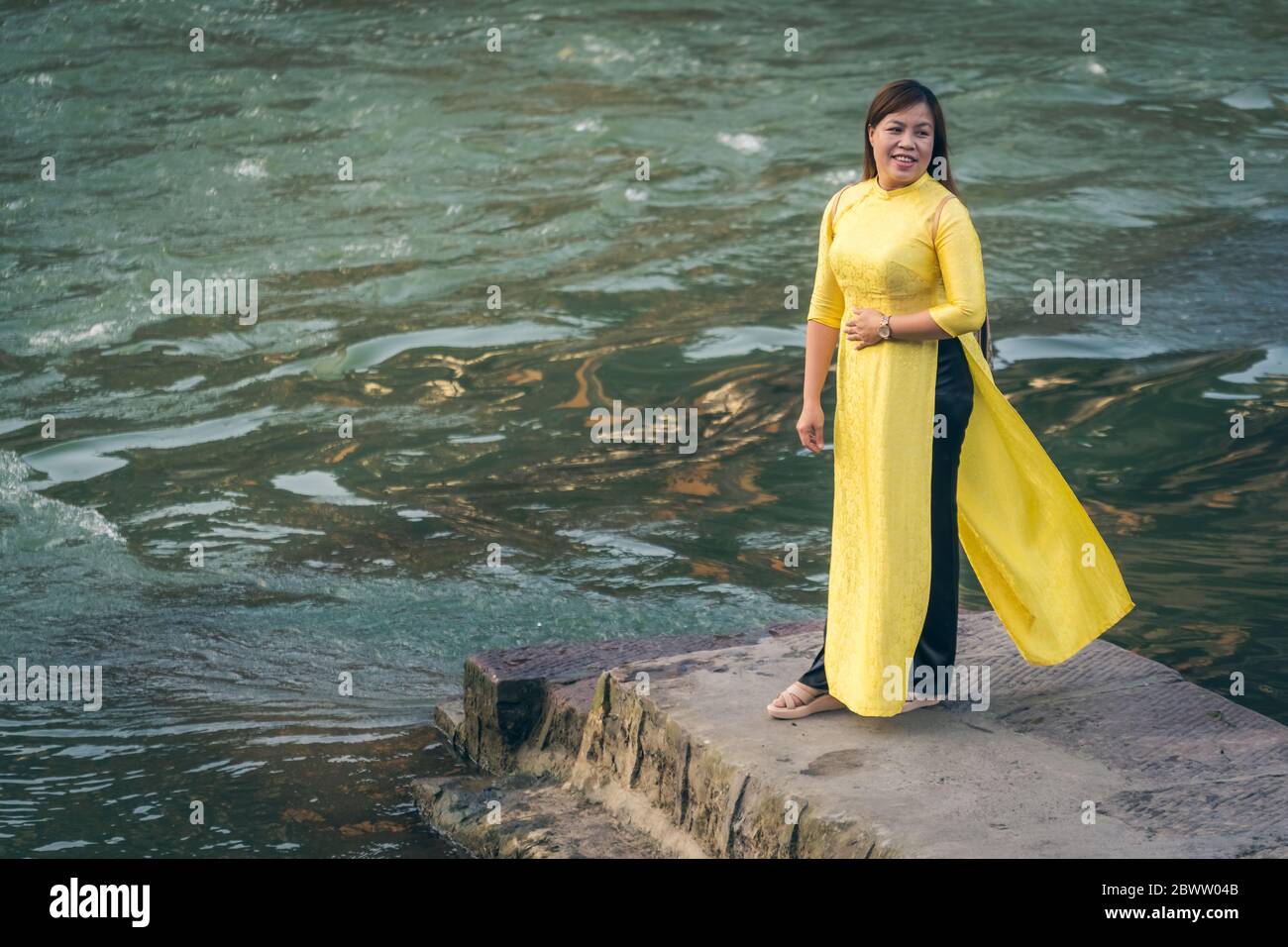 Feng Huang, China - August 2019 : Beautiful Chinese woman dressed in a ...