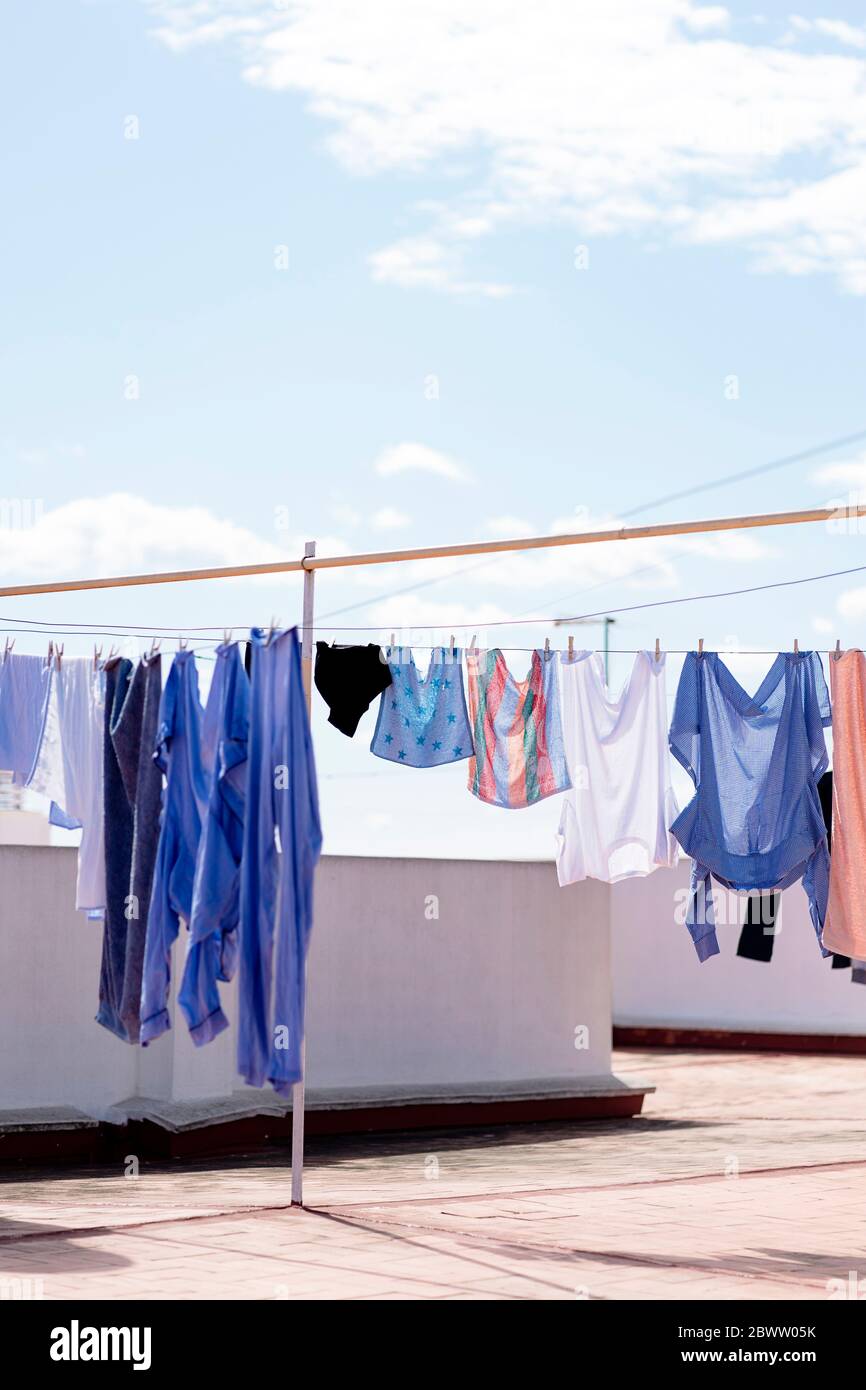Drying laundry on roof hi-res stock photography and images - Alamy