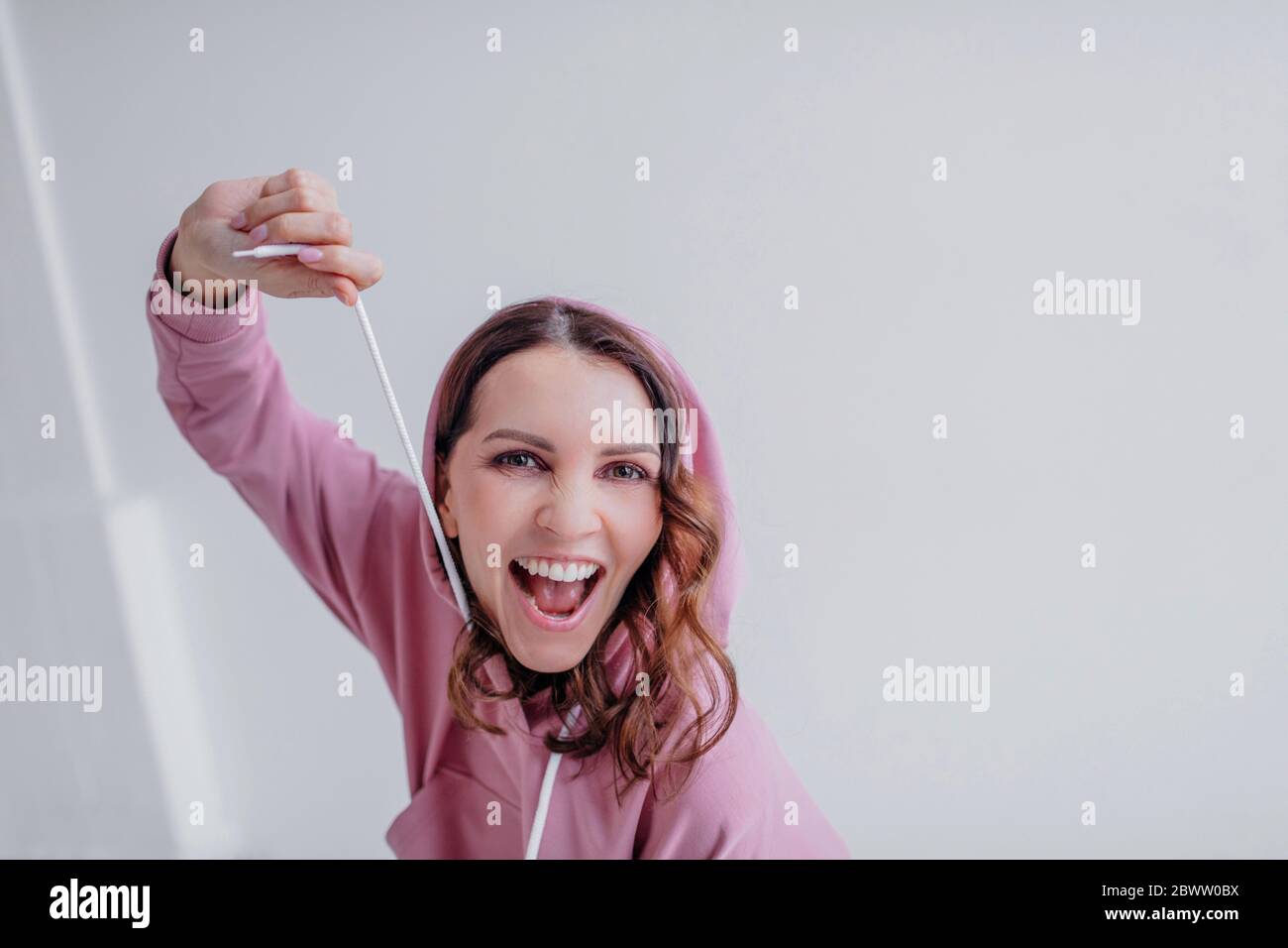 Woman hoodie string hi-res stock photography and images - Alamy