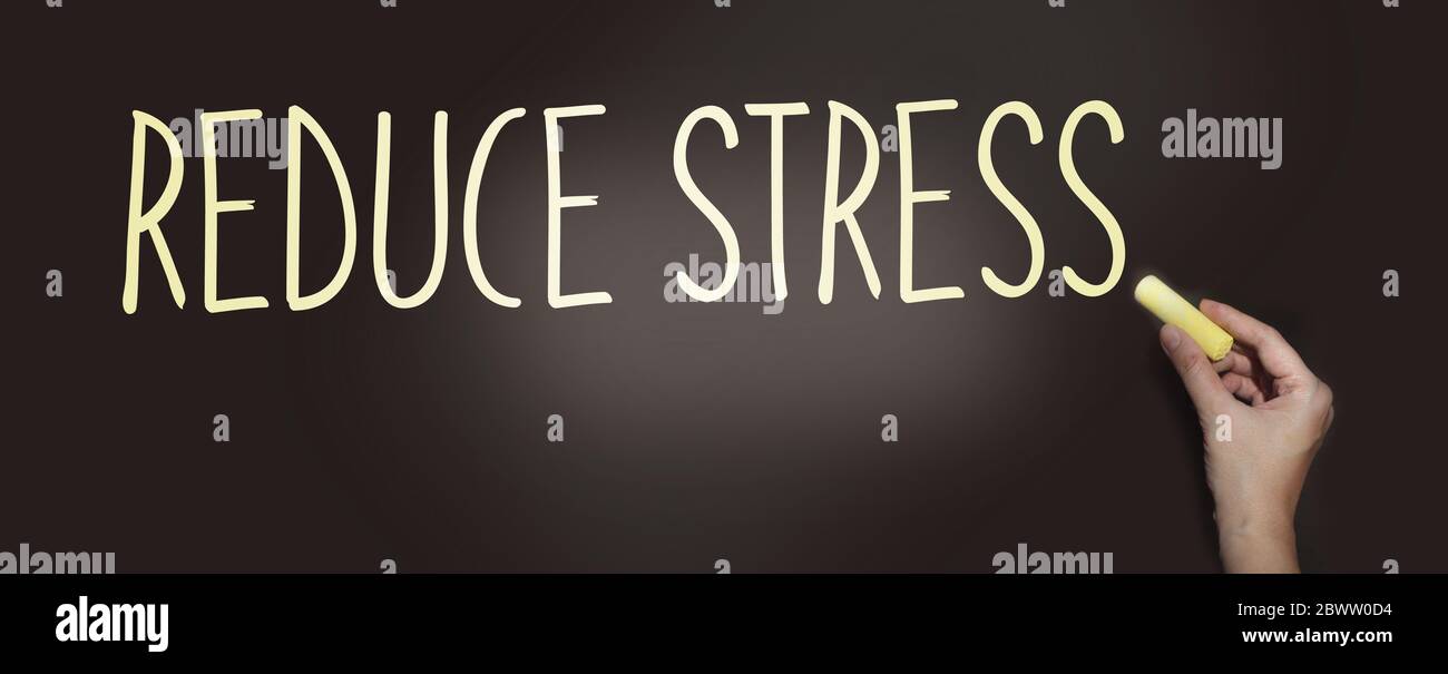 Reduce Stress Written in yellow chalk on a blackboard. No stress and ...