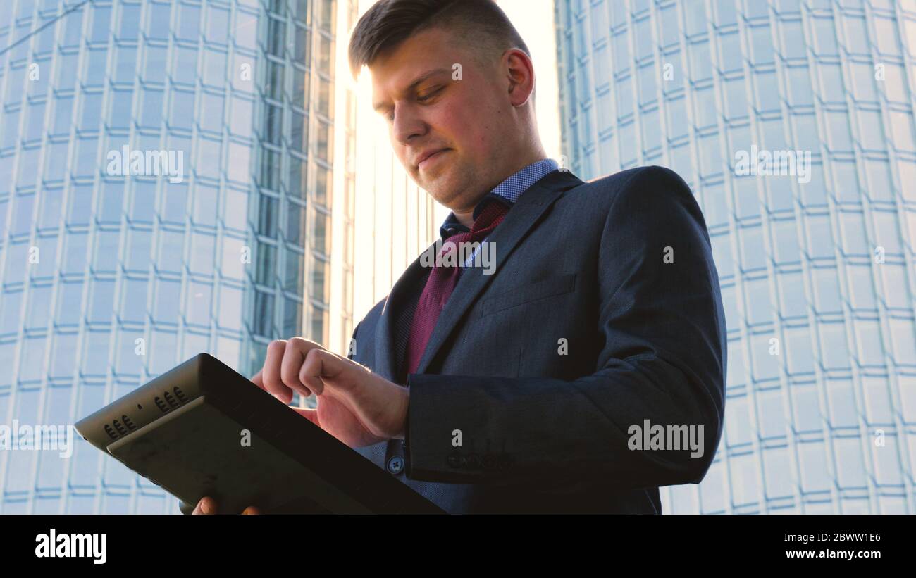 Portrait of a successful young handsome engineer, architect, builder ...