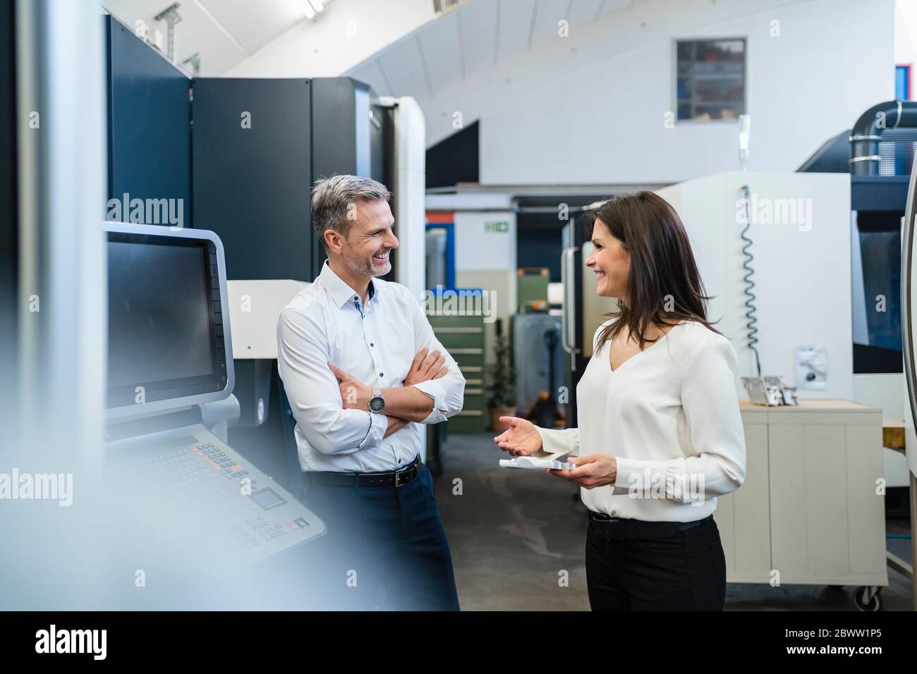 Businessman in factory having hi-res stock photography and images - Alamy