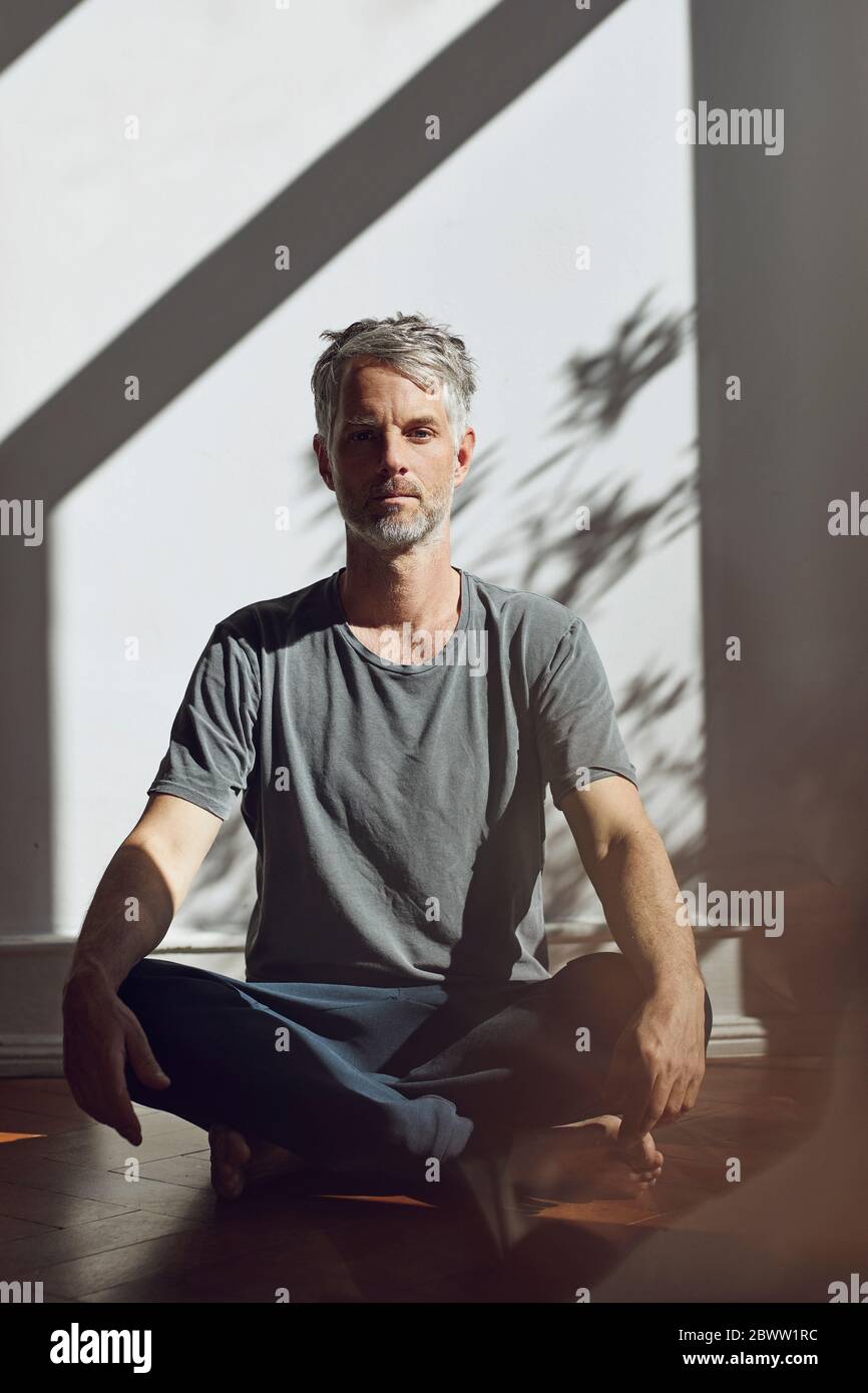 Portrait of meditating man hi-res stock photography and images - Alamy