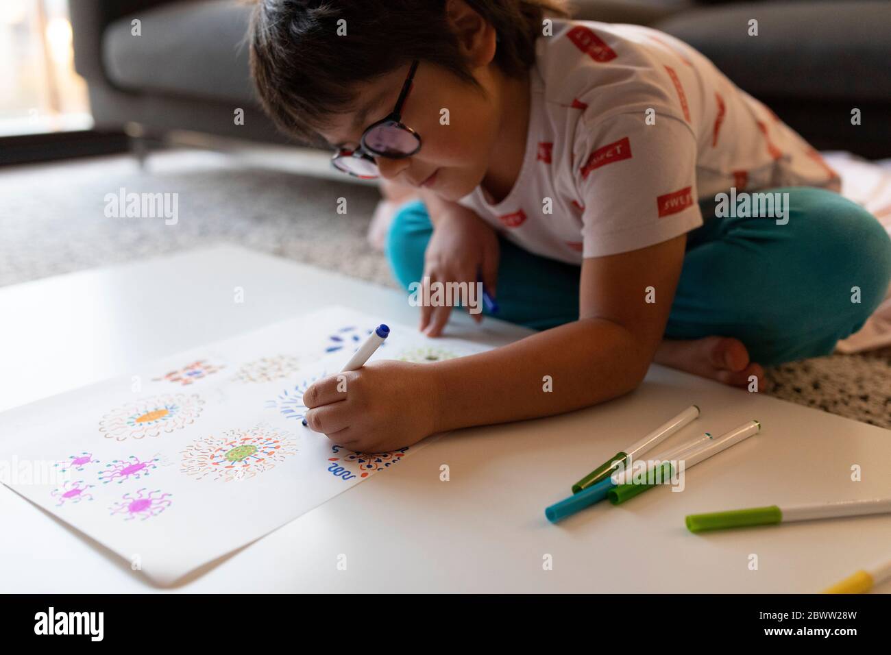 Children drawing on floor hi-res stock photography and images - Alamy