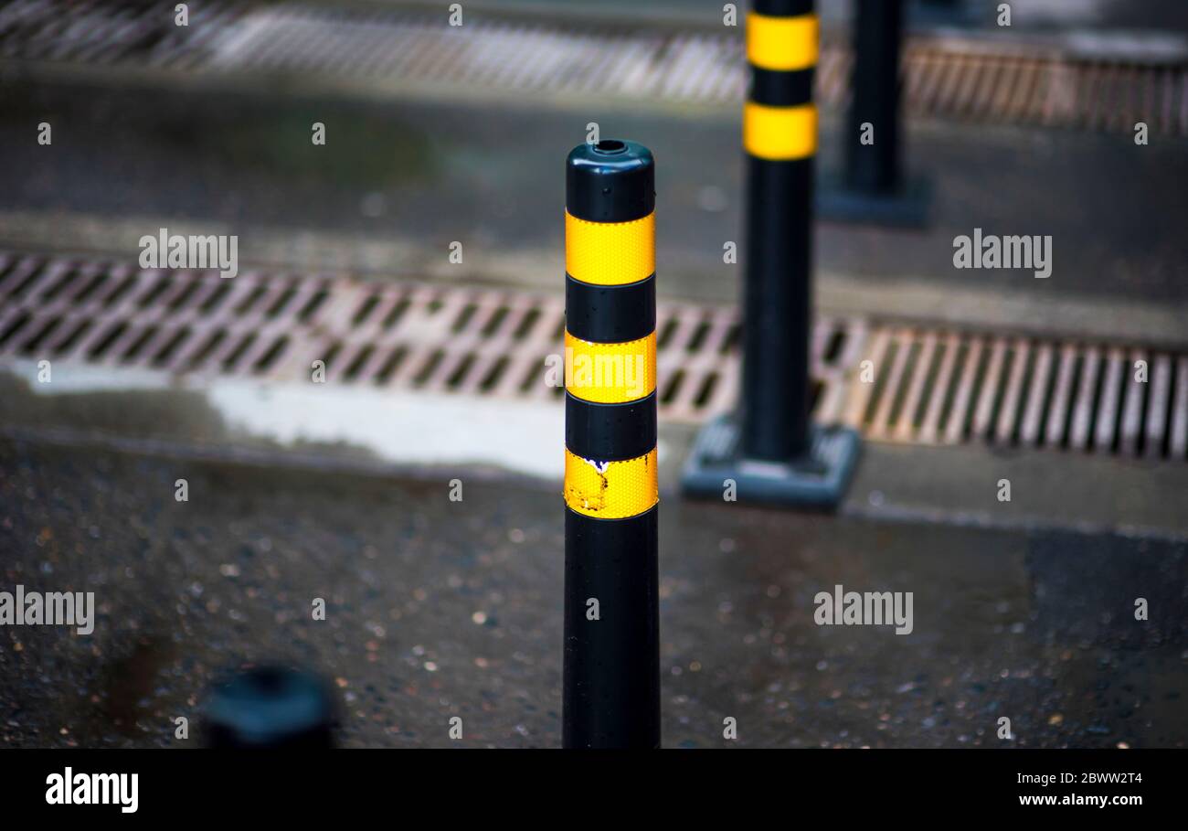 Columns that restrict the movement of vehicles and Parking, bars for ...