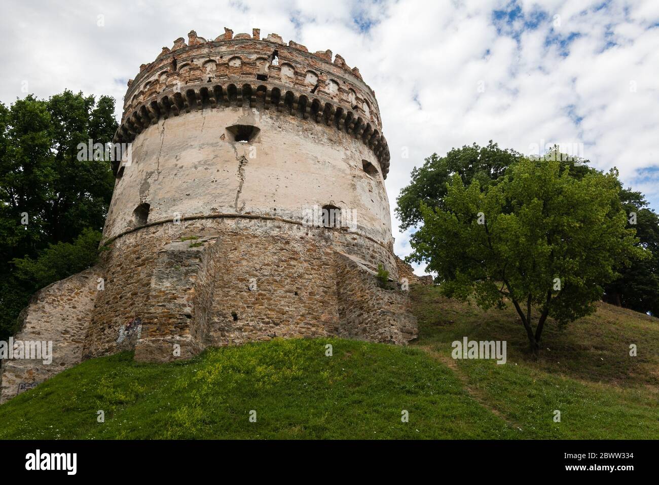 The Round tower of the Ostrog castle in western Ukraine. Bottom view of ...