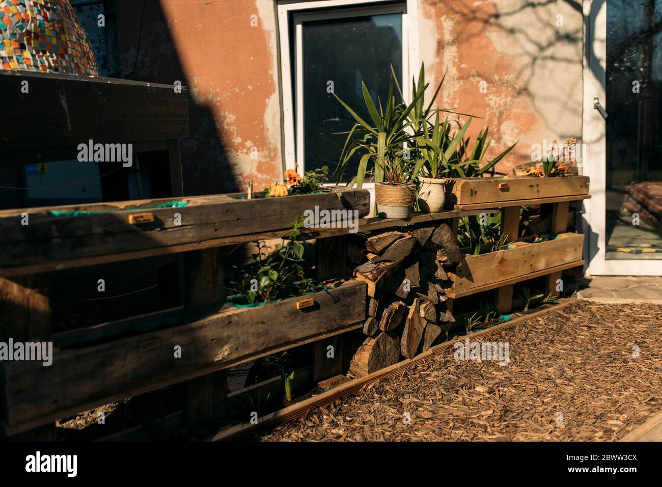 Individual garden at a run down house Stock Photo - Alamy