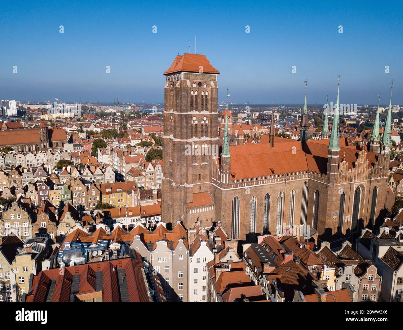Aerial view from drone on St. Mary Cathedral and City Hall spire clock ...