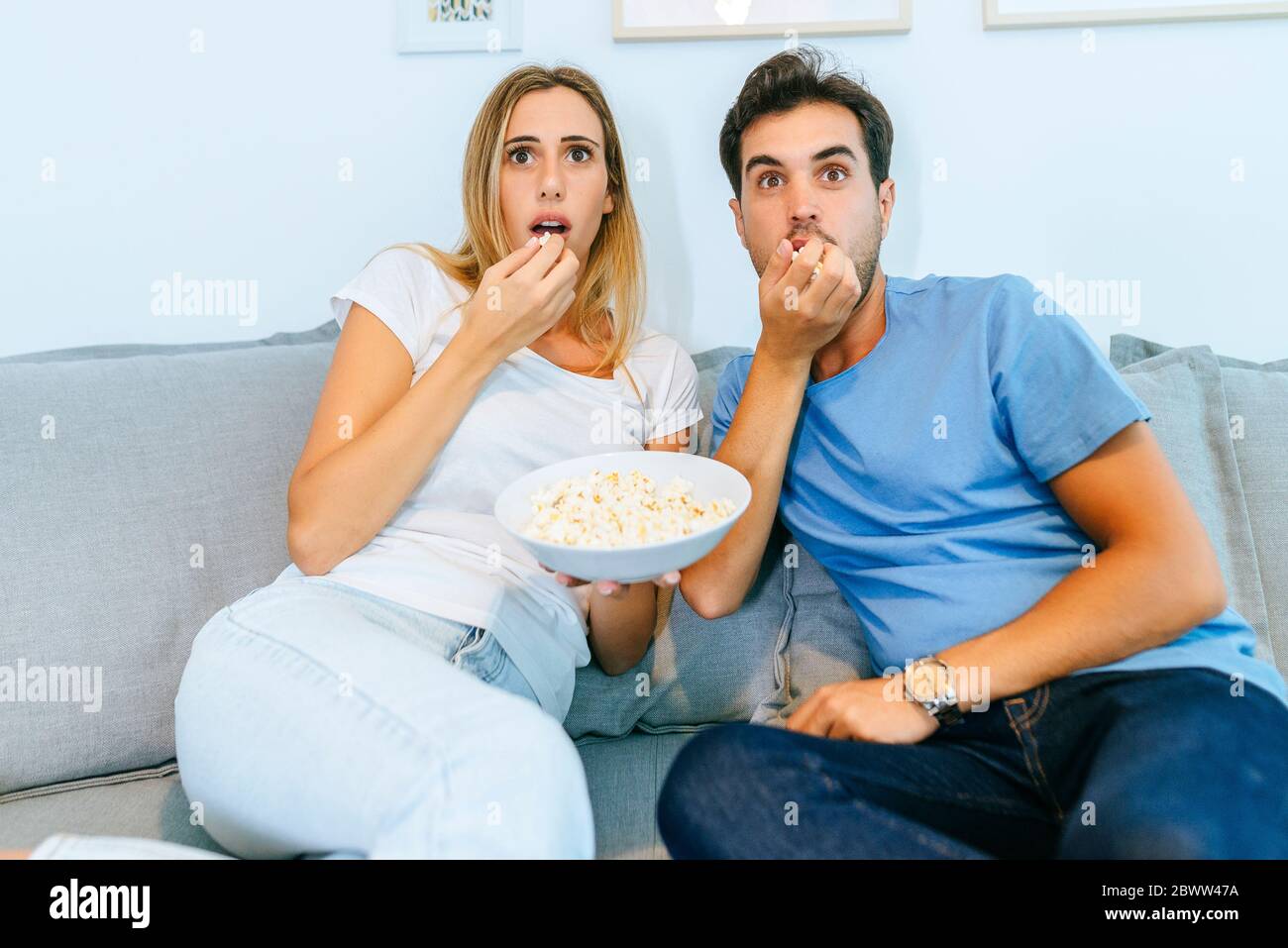 Tv watching eating hi-res stock photography and images - Alamy