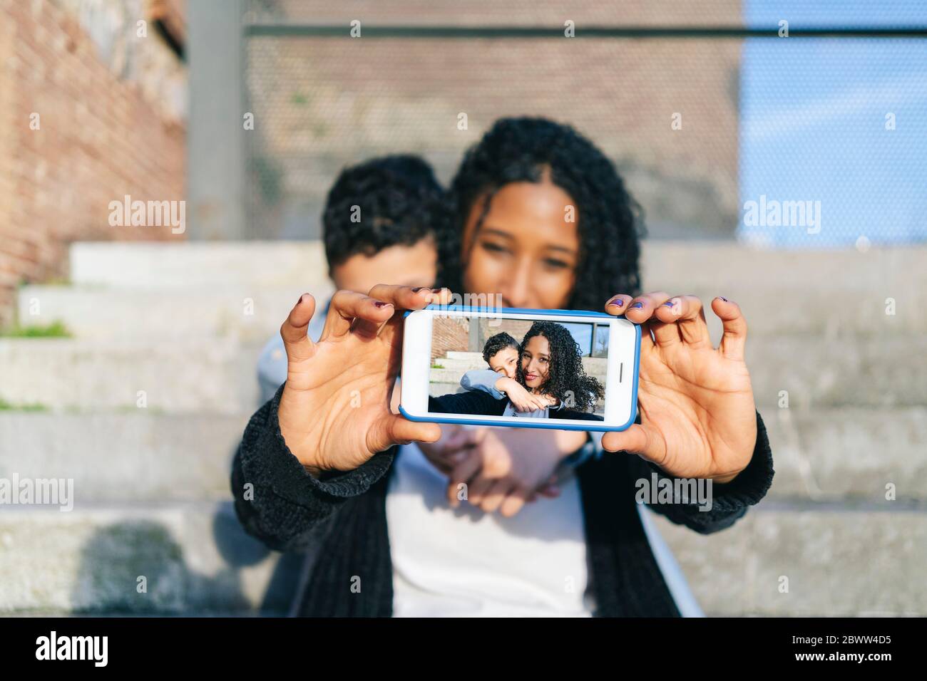 Womans hands holding smartphone selfie hi-res stock photography and ...