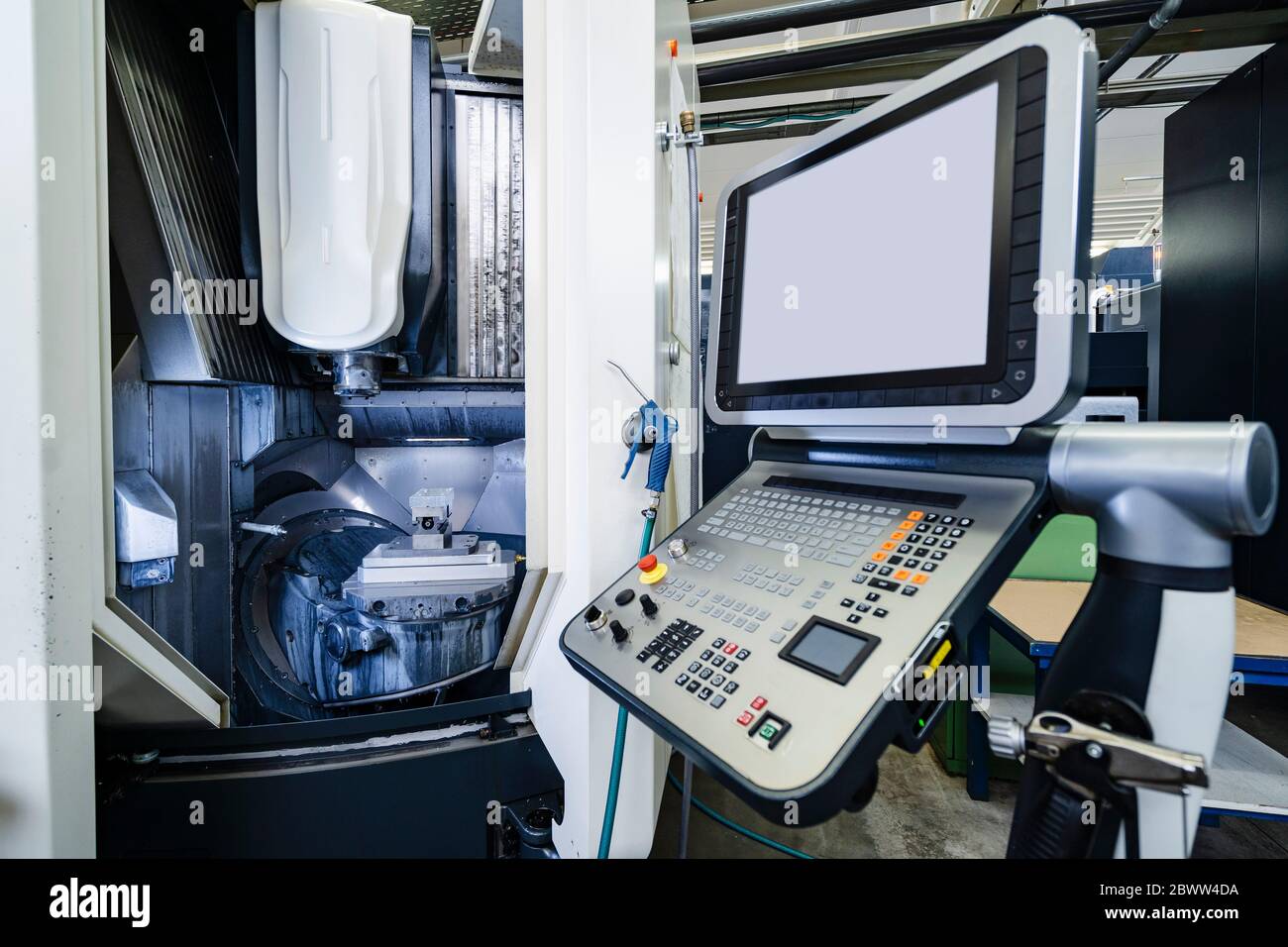 Germany, Bavaria, Munich, Control panel of production hall machinery ...
