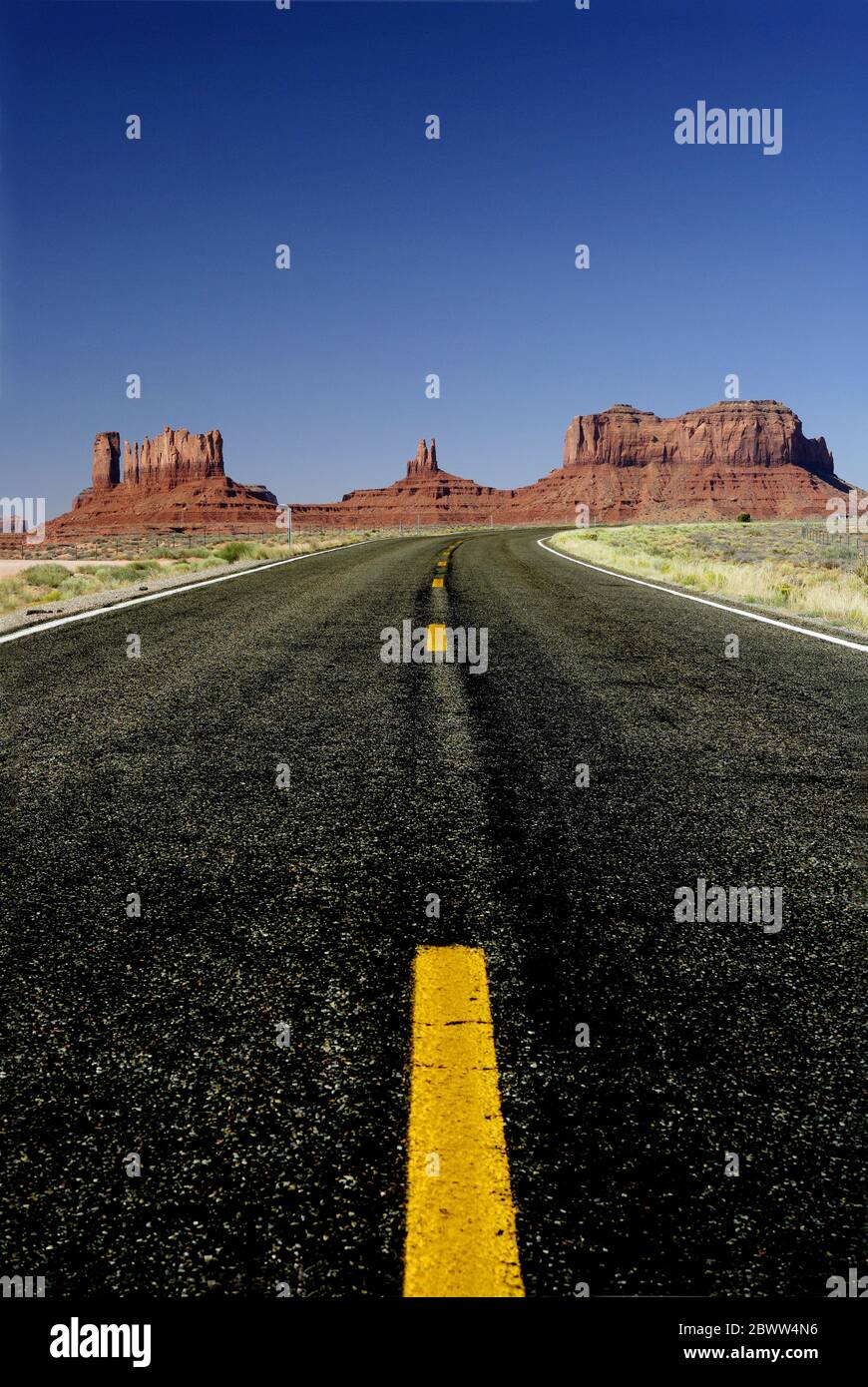 USA, Clear sky over empty highway in Monument Valley Stock Photo - Alamy
