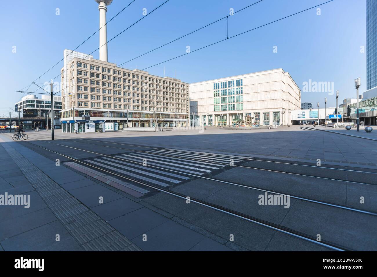 Germany, Berlin, Zebra crossing in front of empty Alexanderplatz during ...