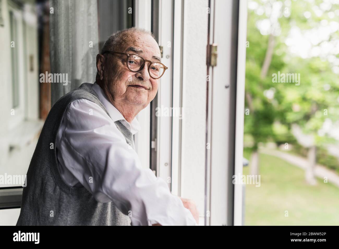 Old man standing at sunset hi-res stock photography and images - Alamy