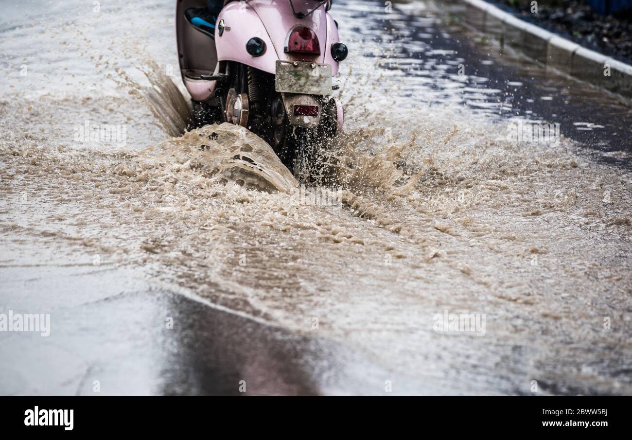 dirty water splash after vehicle roaring by Stock Photo - Alamy