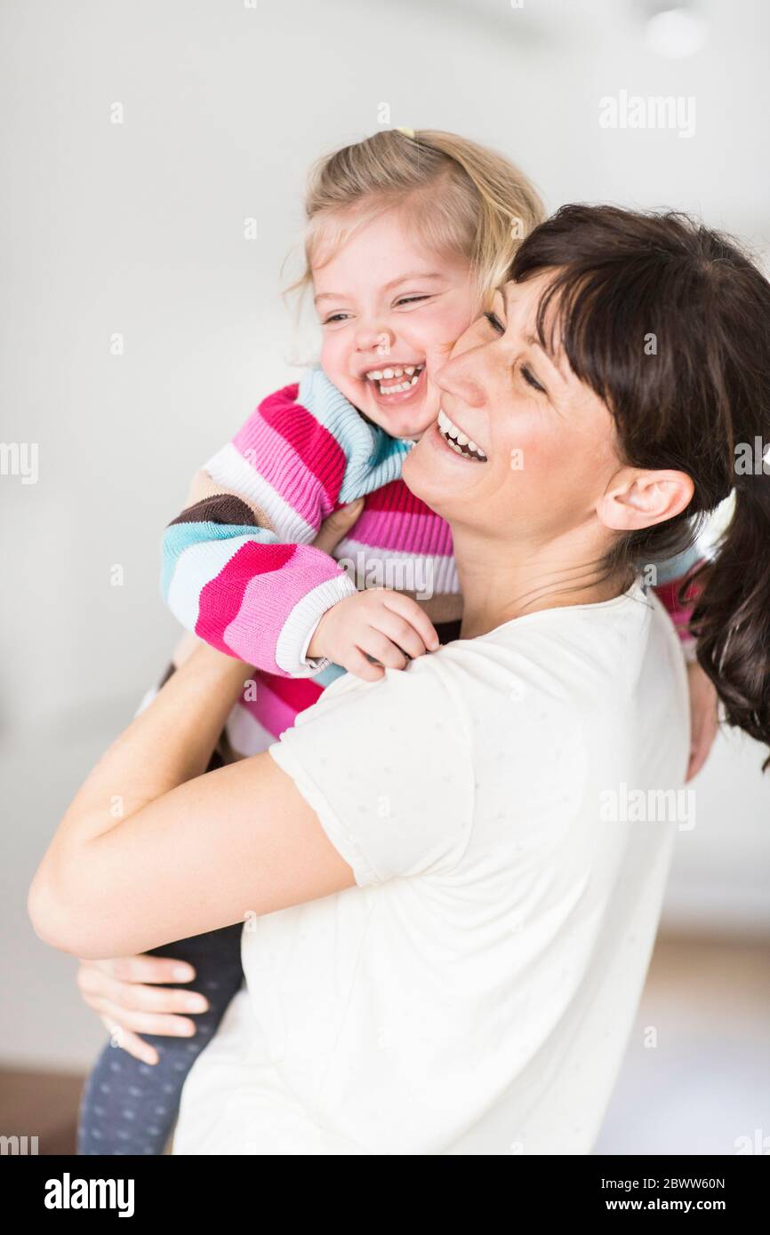 Happy mother daughter laughing hugging hi-res stock photography and ...
