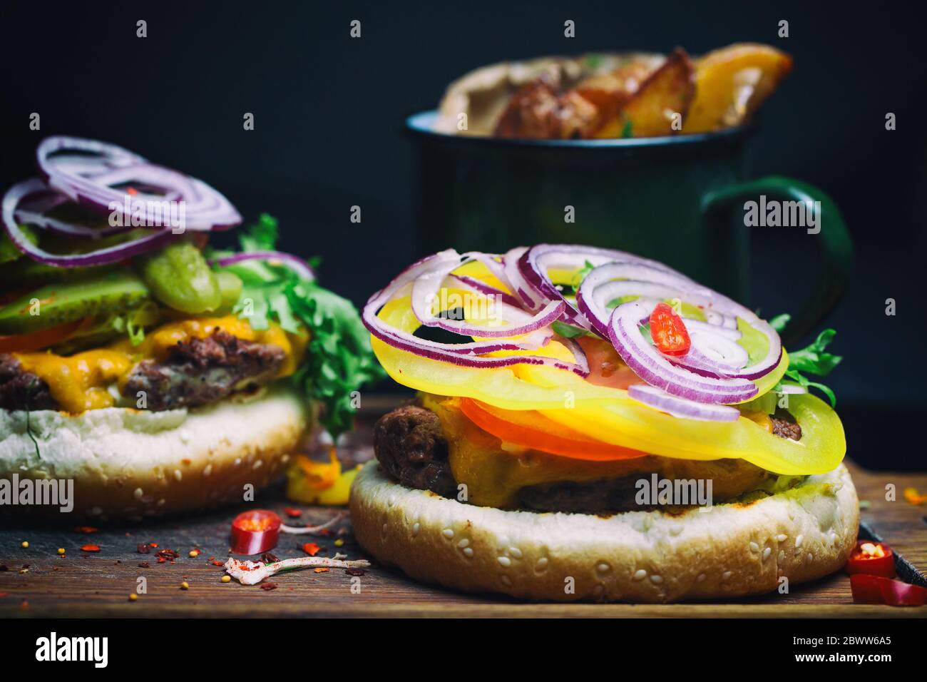 Burger set on a board Stock Photo - Alamy
