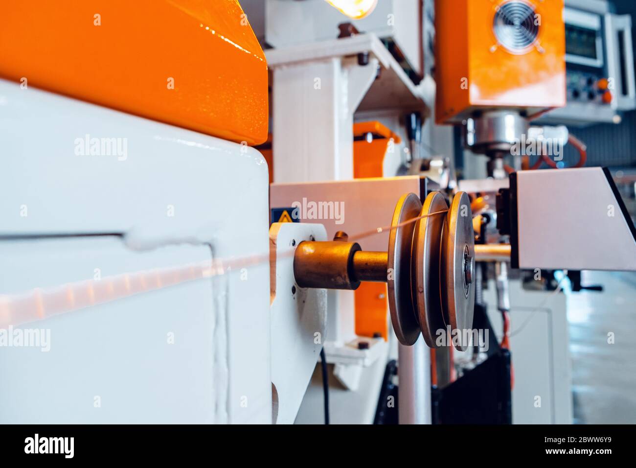 Inside a modern plant producing power electric cables and optical ...