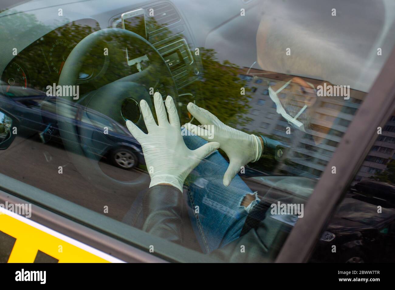 Taxi driver in gloves hi-res stock photography and images - Alamy
