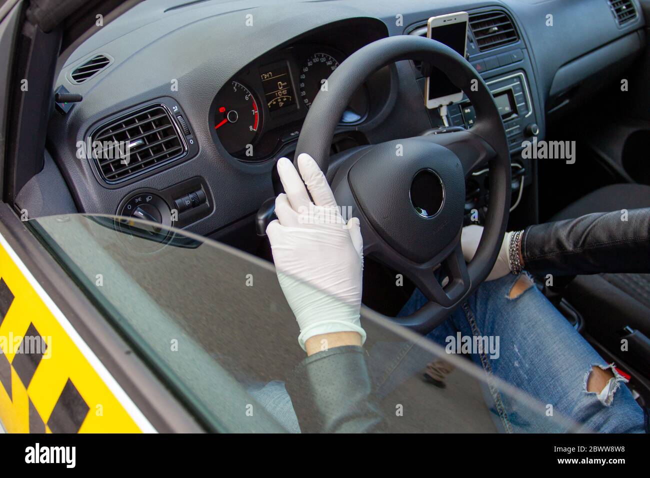 Taxi driver in gloves hi-res stock photography and images - Alamy